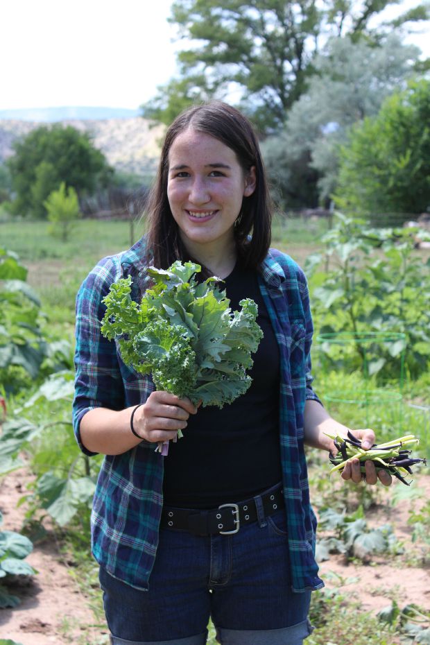 Caitlyn with harvest – Ever Growing Farm